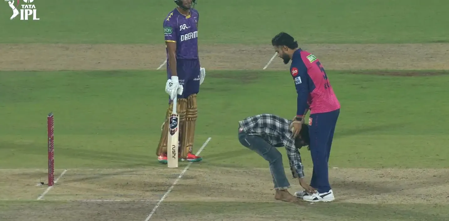 IPL 2025: Another security breach as fan falls at Riyan Parag’s feet ...